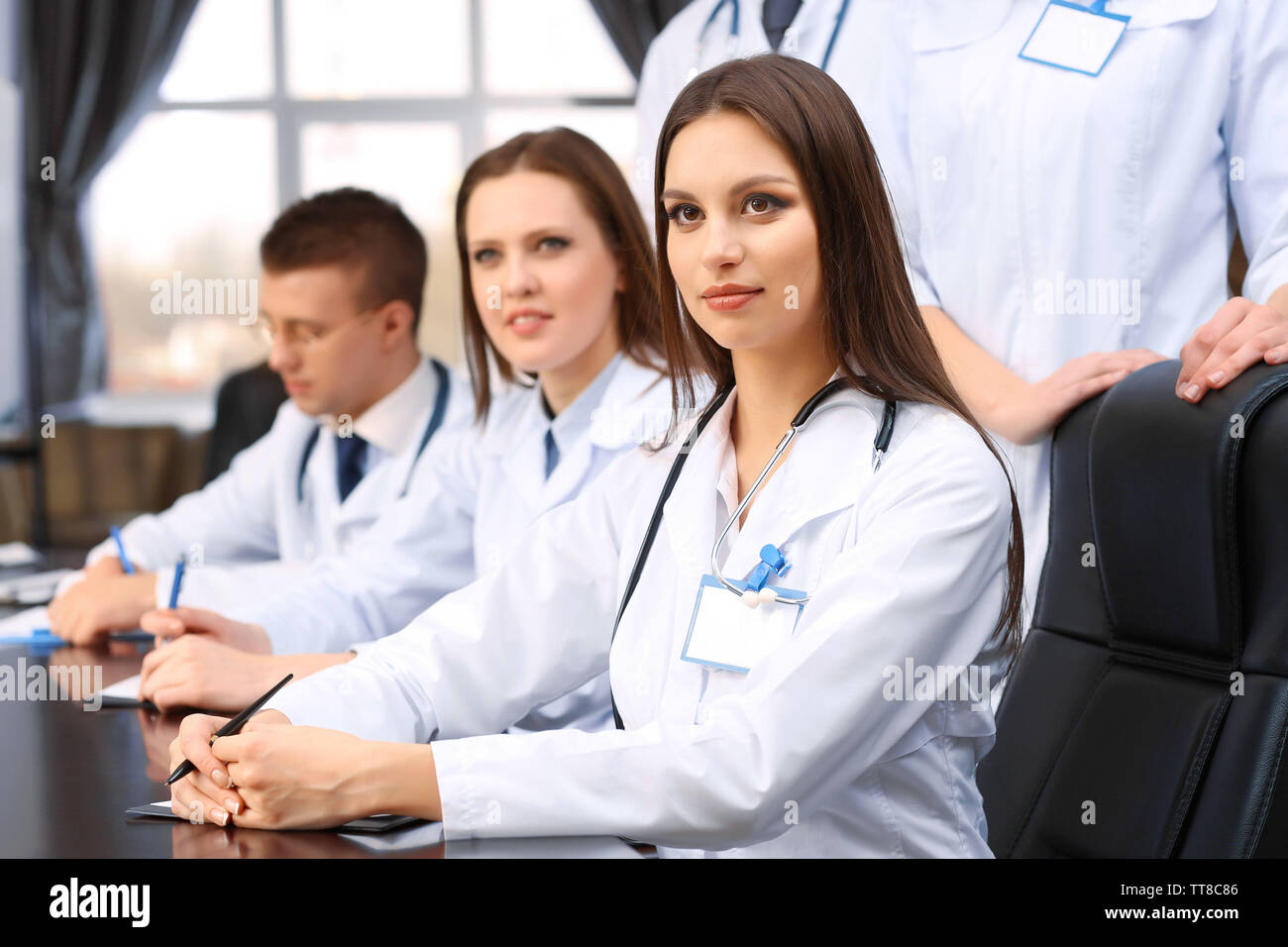 Medical workers working in conference room Stock Photo - Alamy
