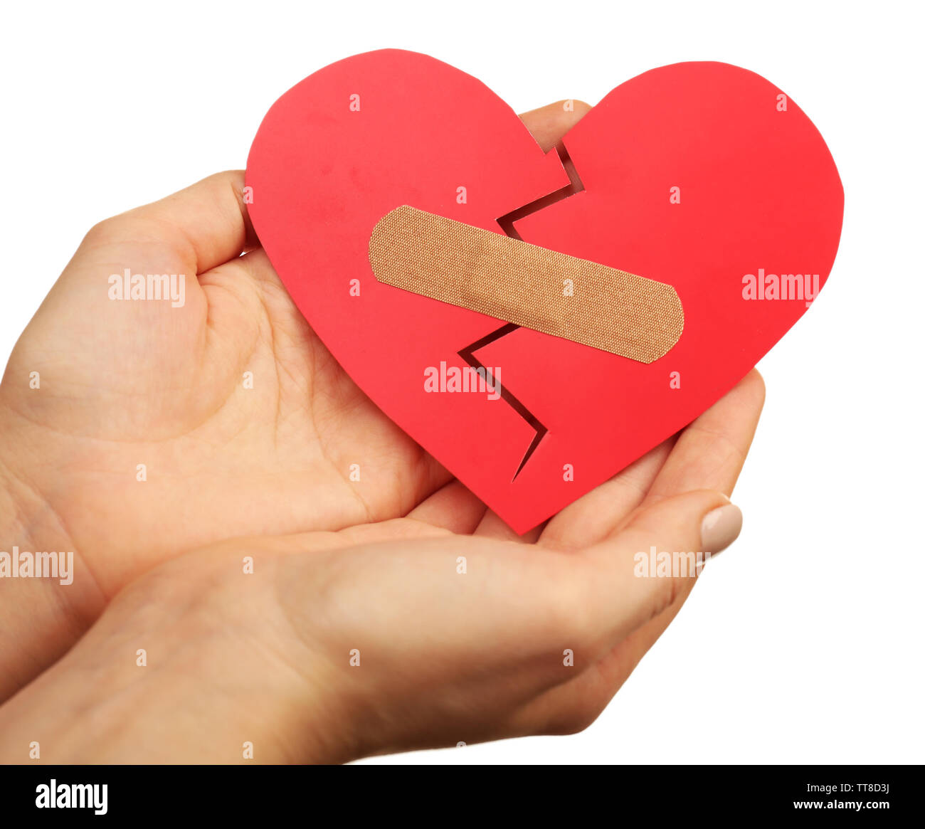 Female hands holding broken heart with plaster isolated on white Stock ...