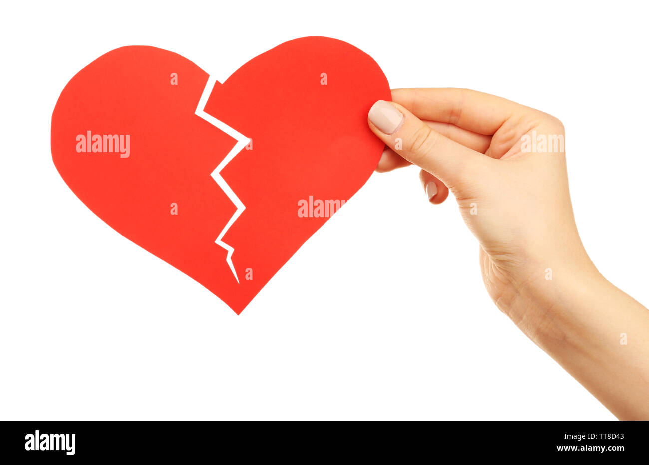 Female hand holding broken heart isolated on white Stock Photo - Alamy