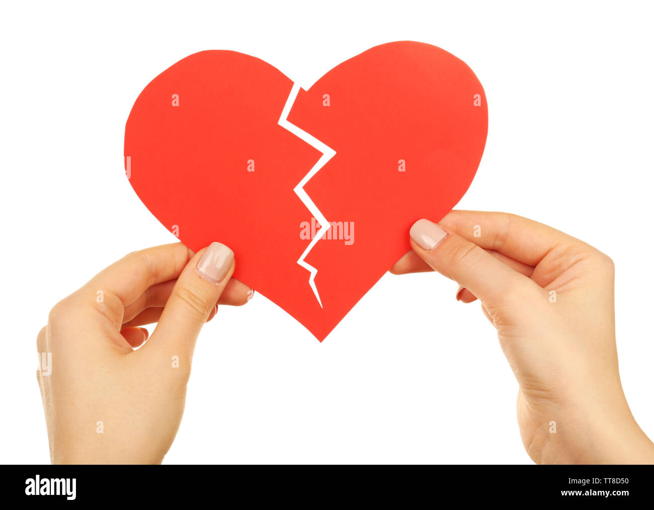 Female hands holding broken heart isolated on white Stock Photo - Alamy