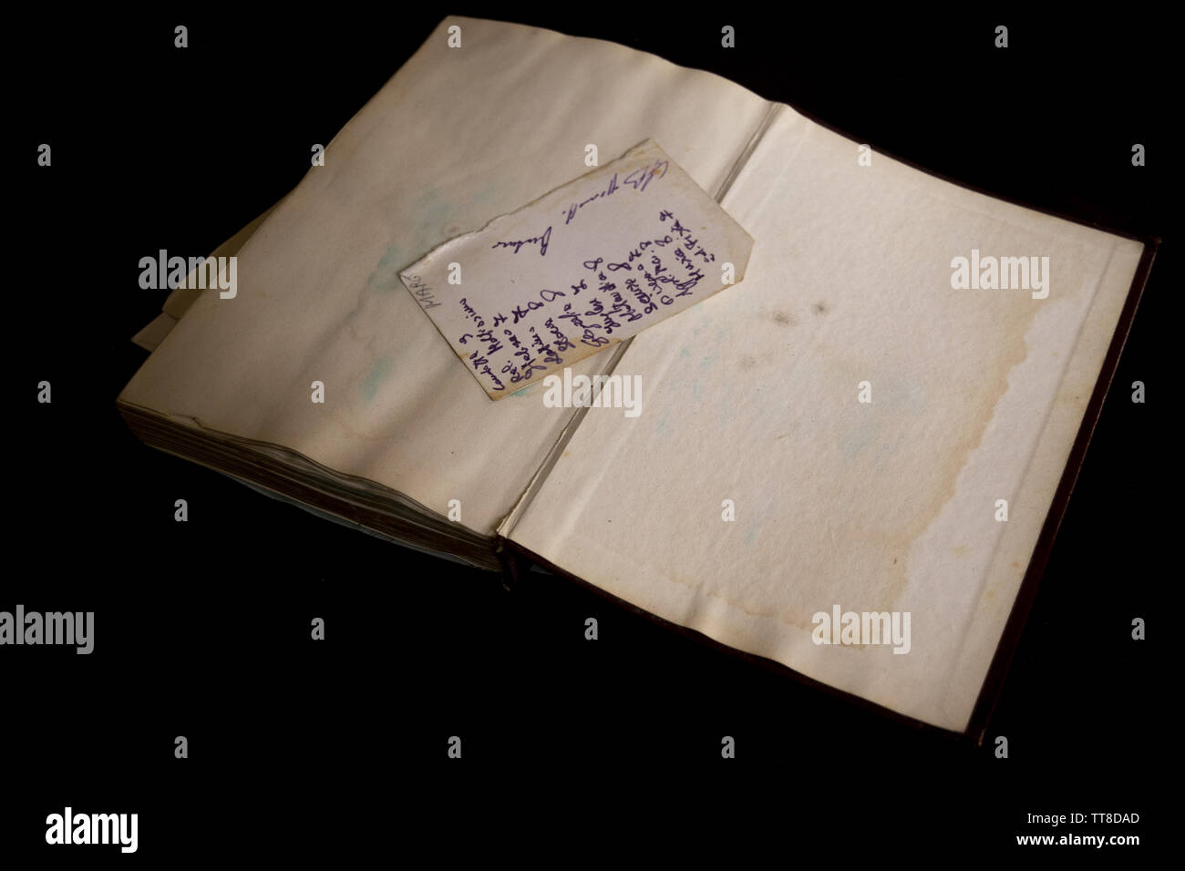 ancient handwritten note on an yellowed page of an old book Stock Photo ...