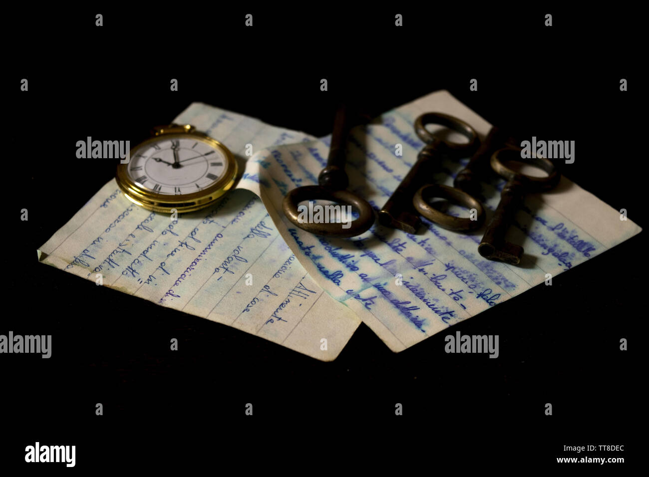 ancient keys and pocket clock on a handwritten letters Stock Photo - Alamy