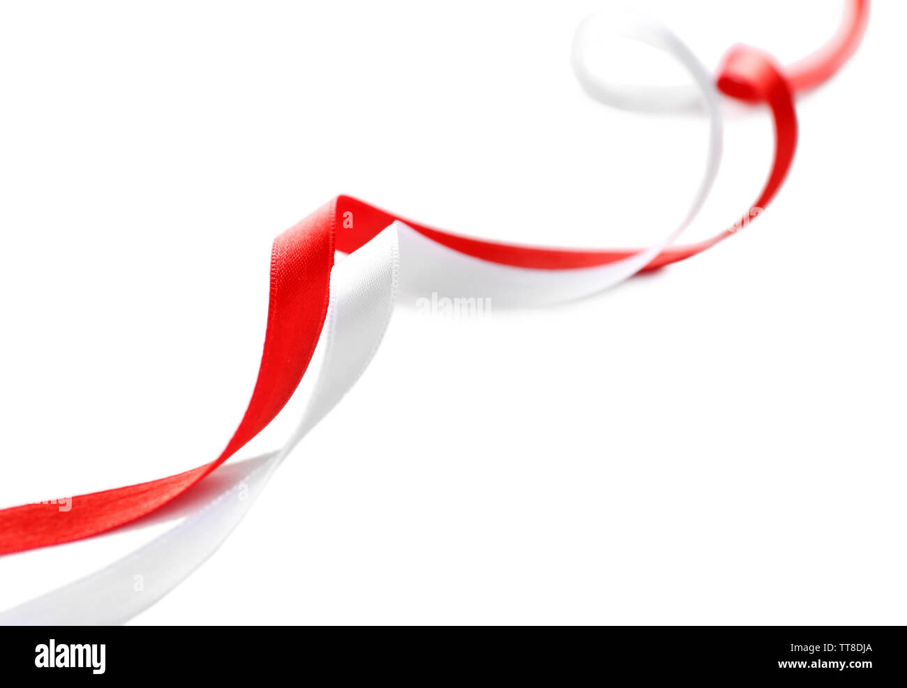 Colorful red and white ribbons isolated on white Stock Photo - Alamy