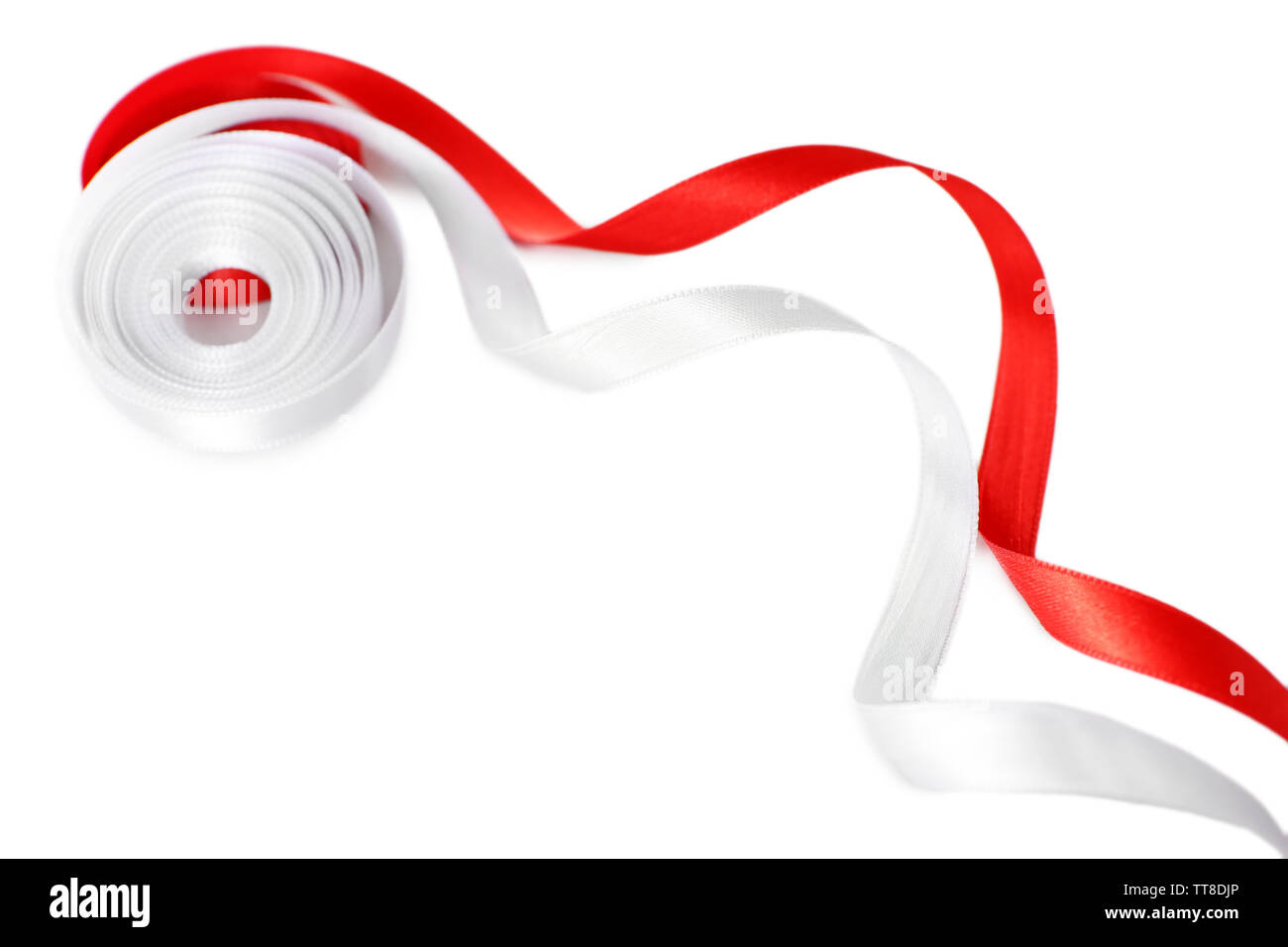 Colorful red and white ribbons isolated on white Stock Photo - Alamy