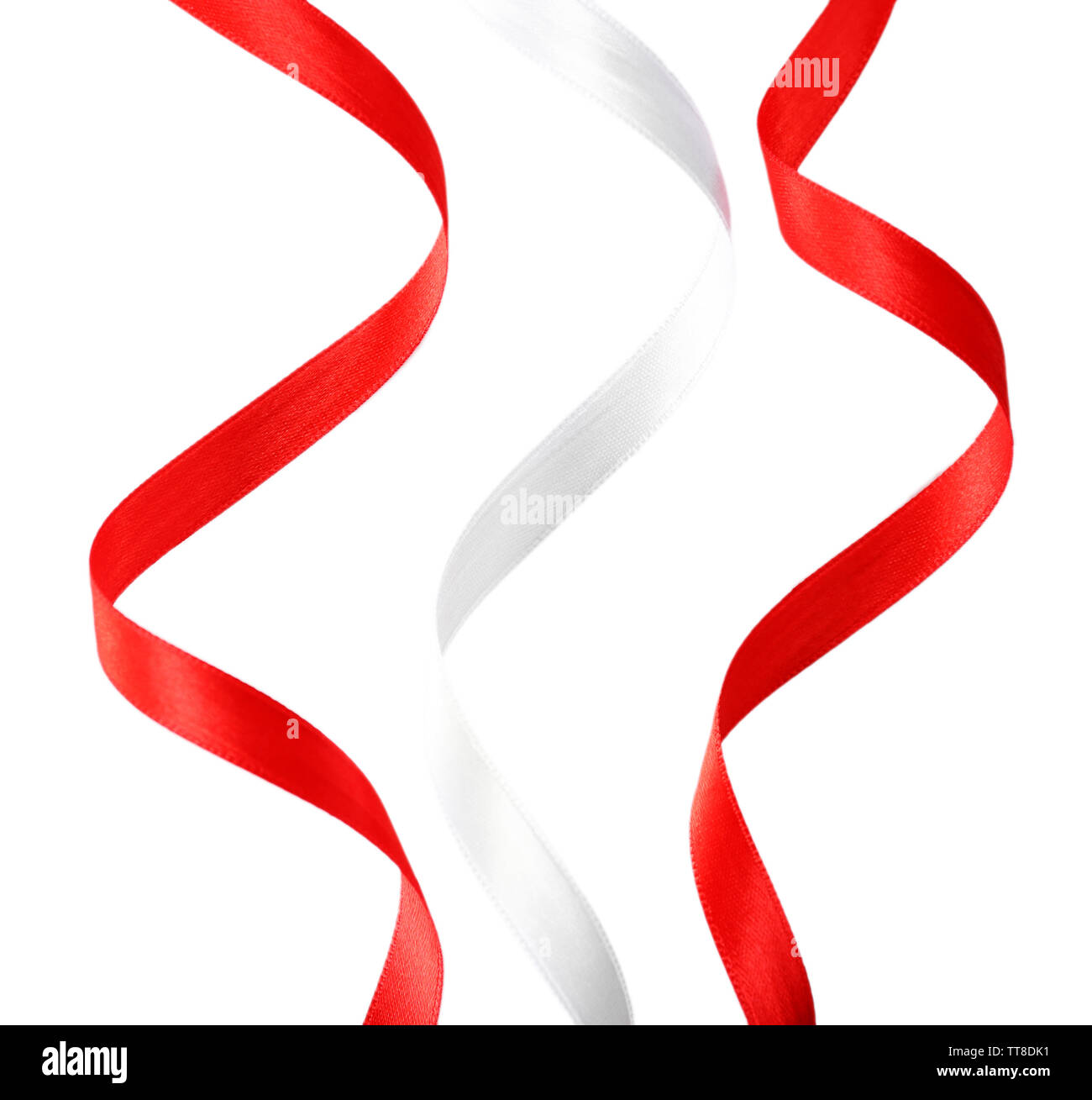 Colorful red and white ribbons isolated on white Stock Photo - Alamy