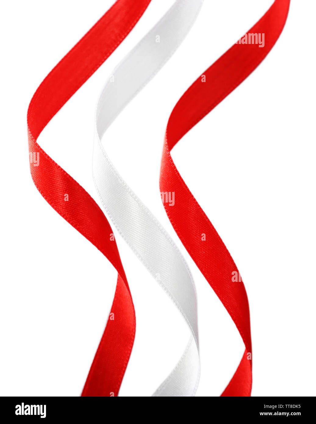 Colorful red and white ribbons isolated on white Stock Photo - Alamy