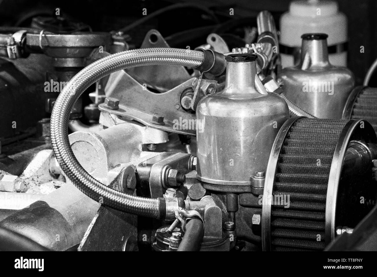 Detailed images of an MG sports car engine taken in black and white ...