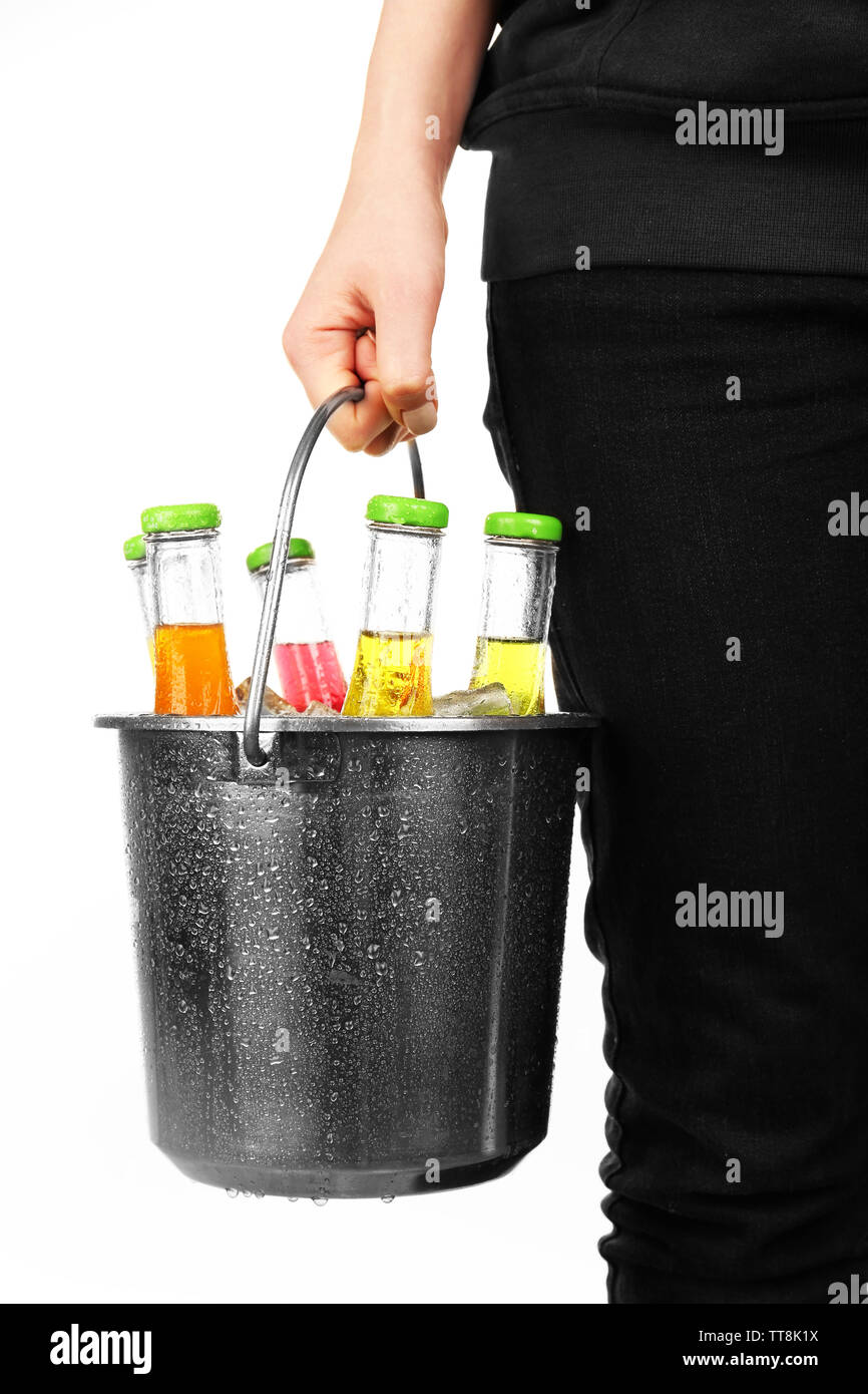 Female hand with metal bucket of alcoholic cocktails isolated on white ...