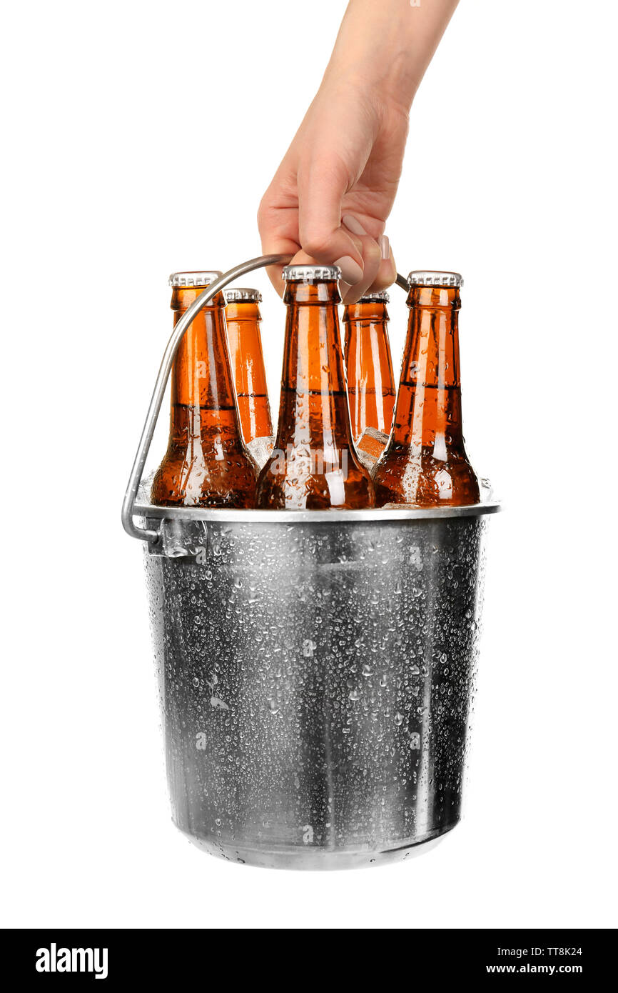 Female hand with metal bucket of beer isolated on white Stock Photo - Alamy