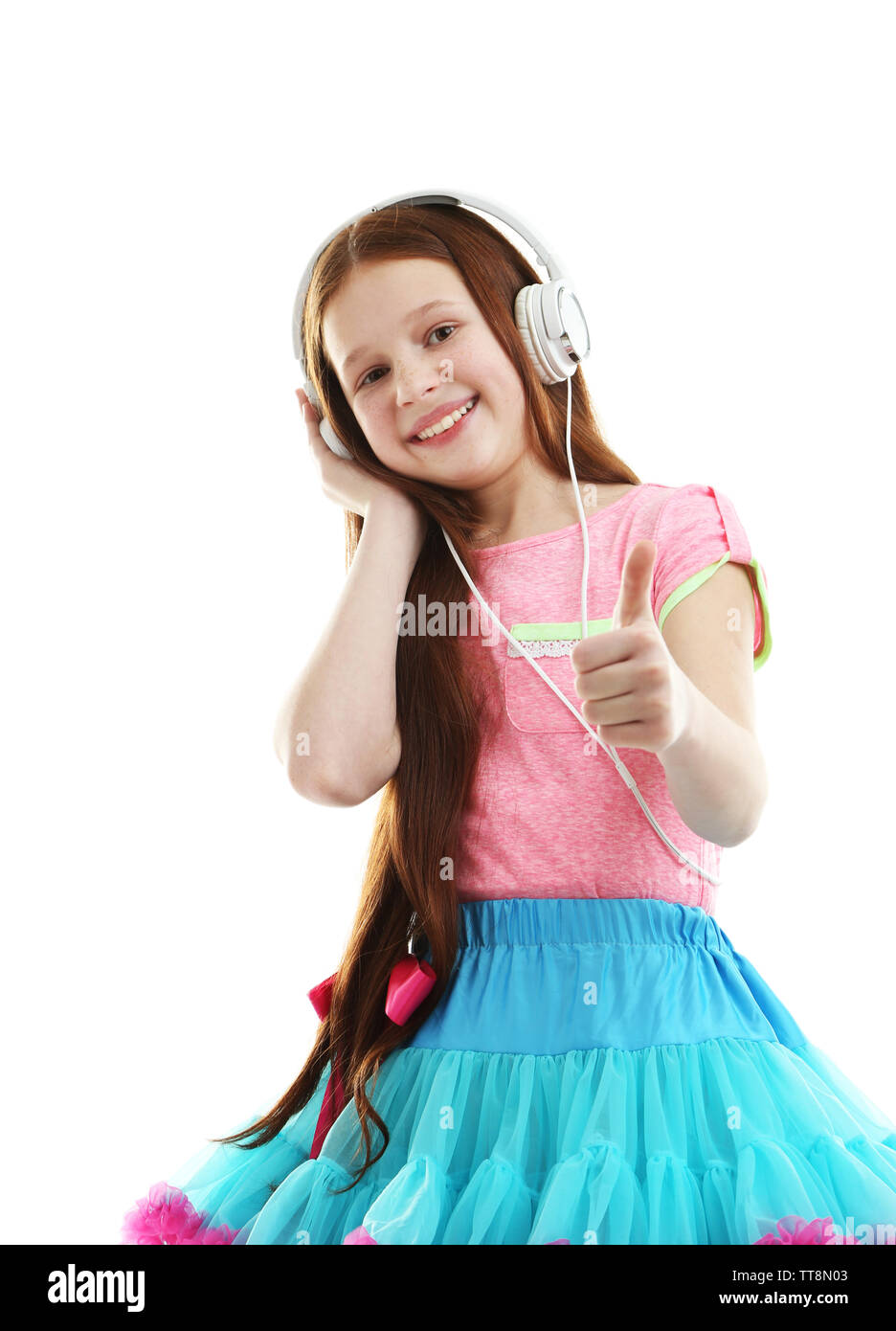 Beautiful little girl with headphones, isolated on white Stock Photo ...