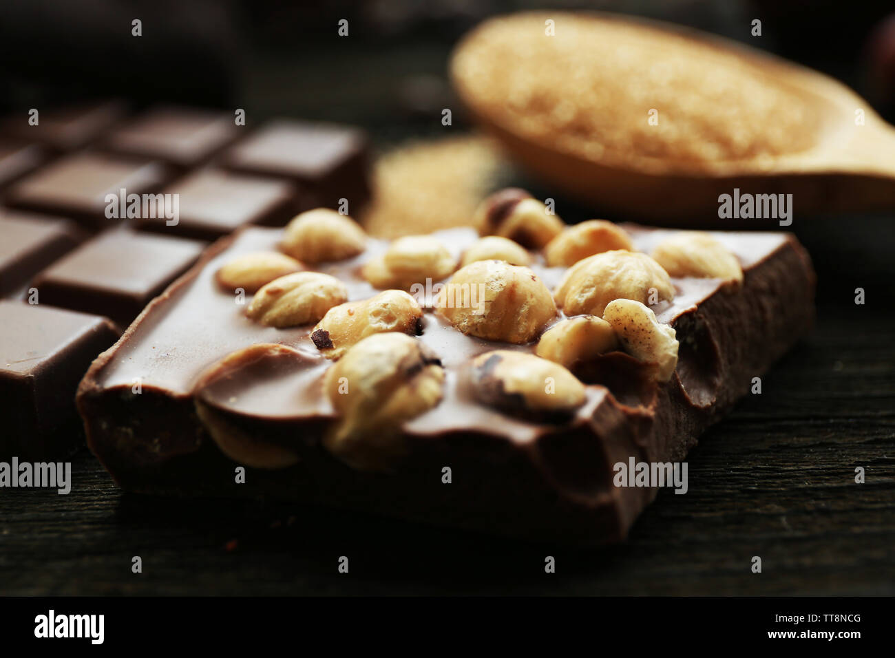 Still life with set of chocolate with nuts, closeup Stock Photo - Alamy