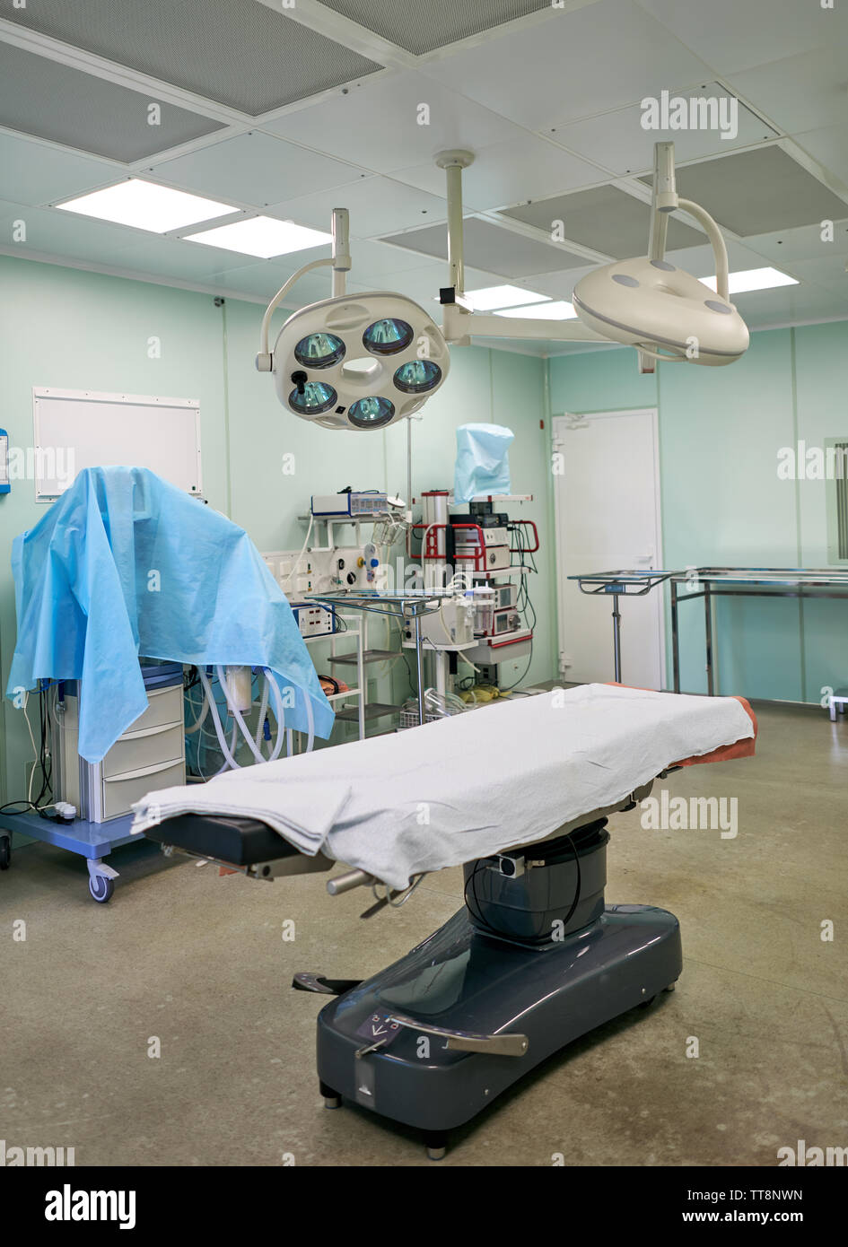 lamp above the operating table in an empty room Stock Photo - Alamy