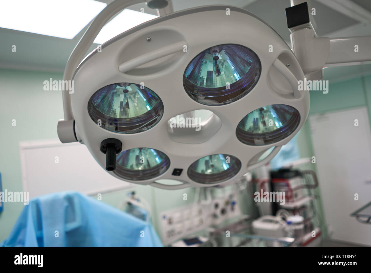 lamp above the operating table in an empty room Stock Photo - Alamy