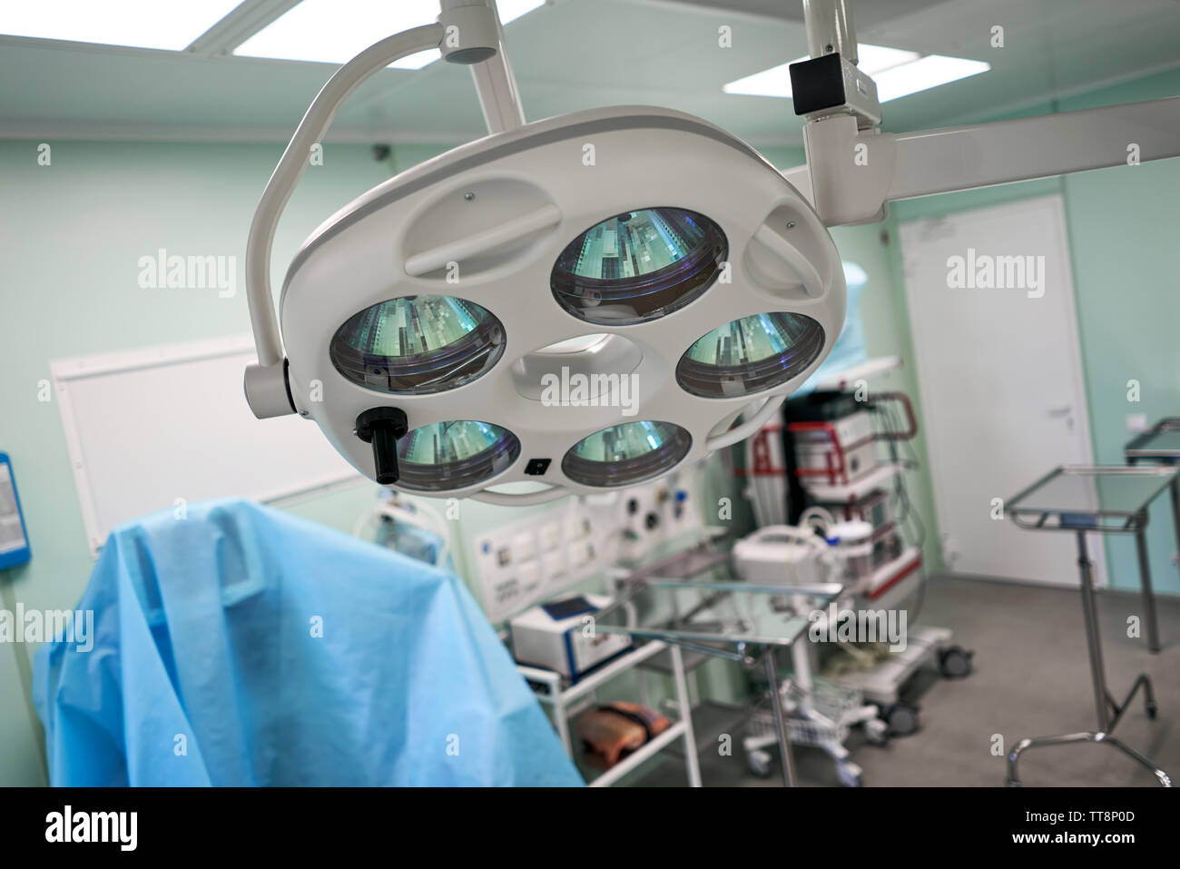 lamp above the operating table in an empty room Stock Photo - Alamy