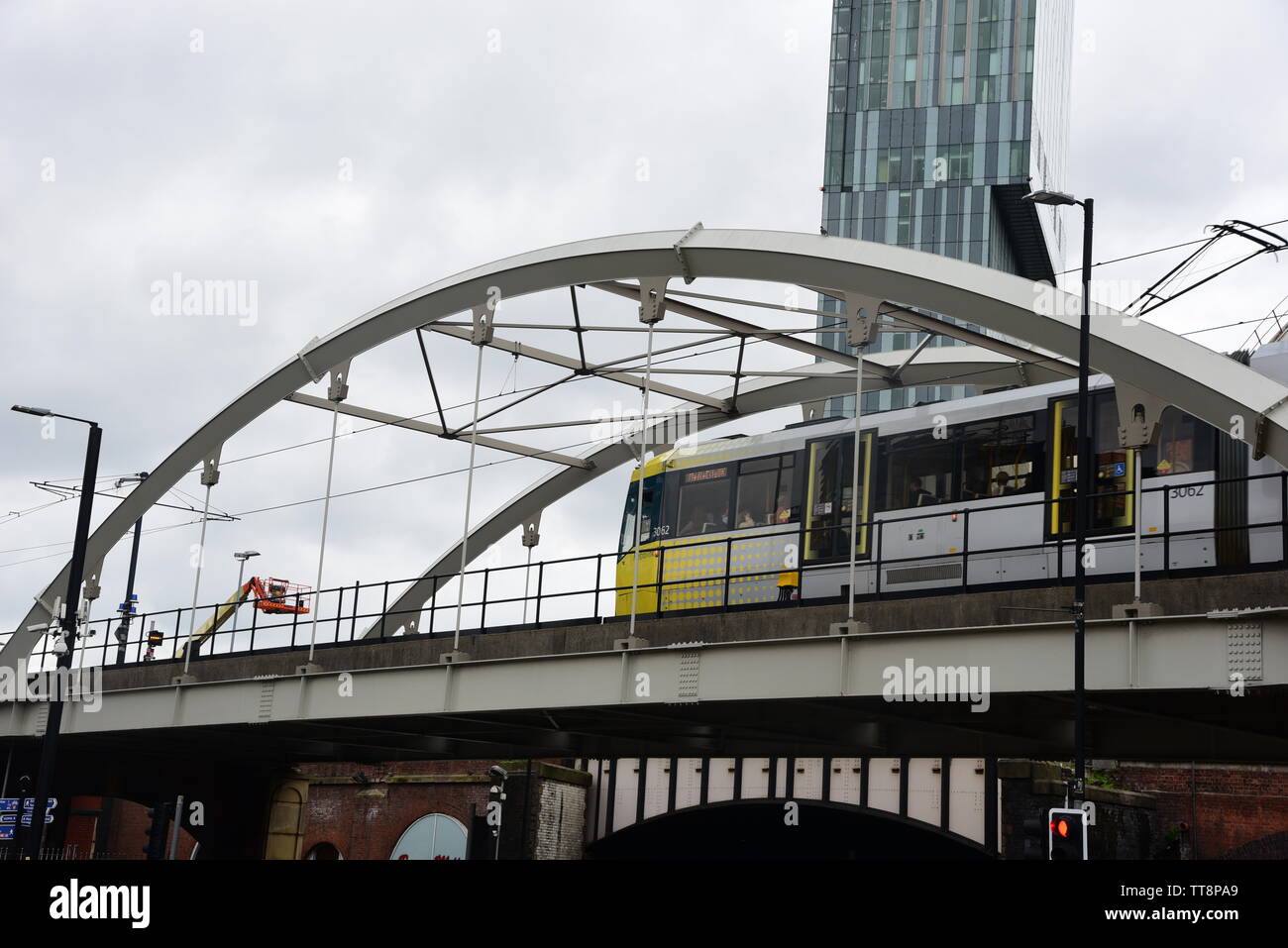Manchester metrolink tram crossing bridge hi-res stock photography and ...