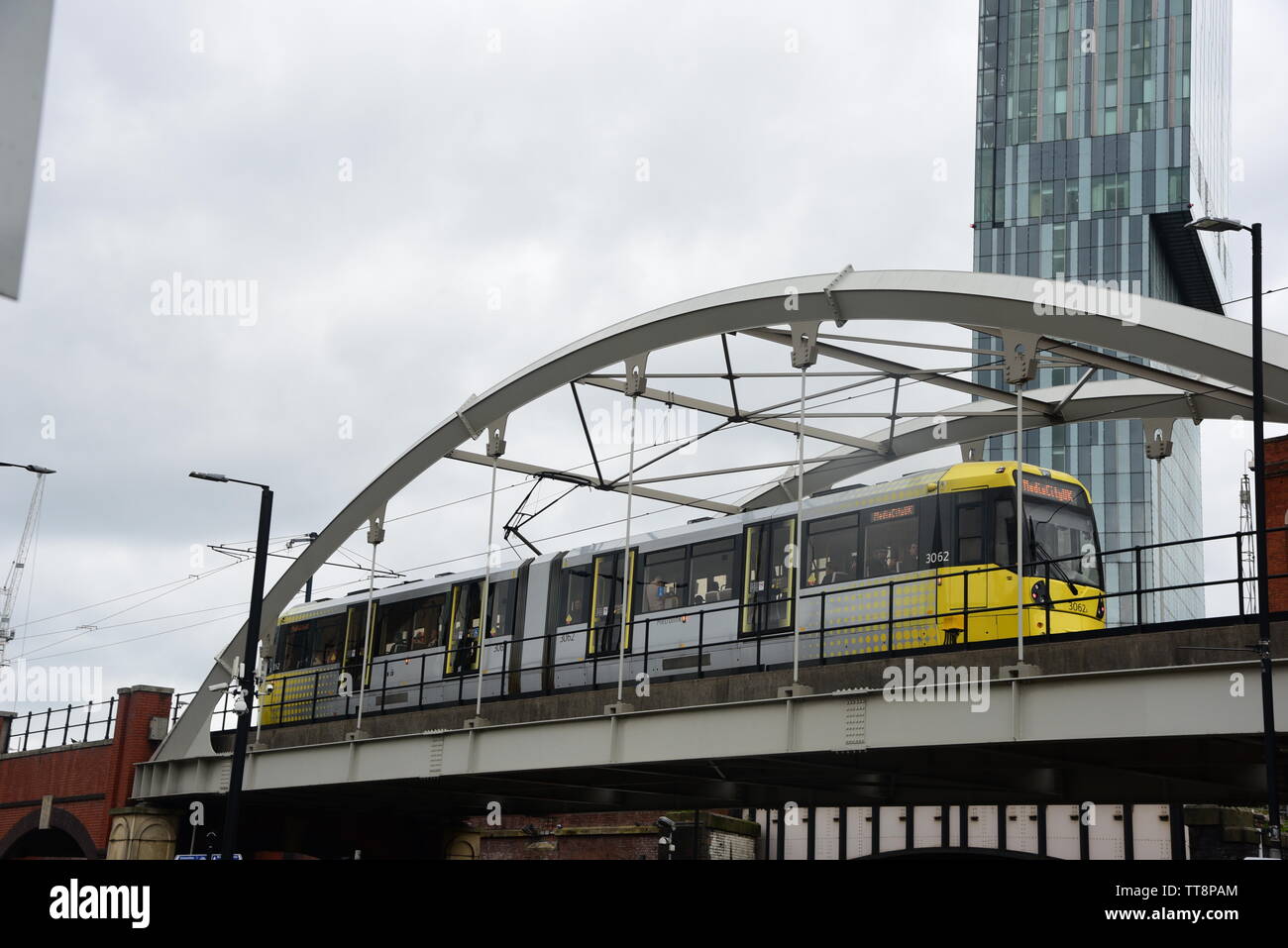 Manchester metrolink tram crossing bridge hi-res stock photography and ...