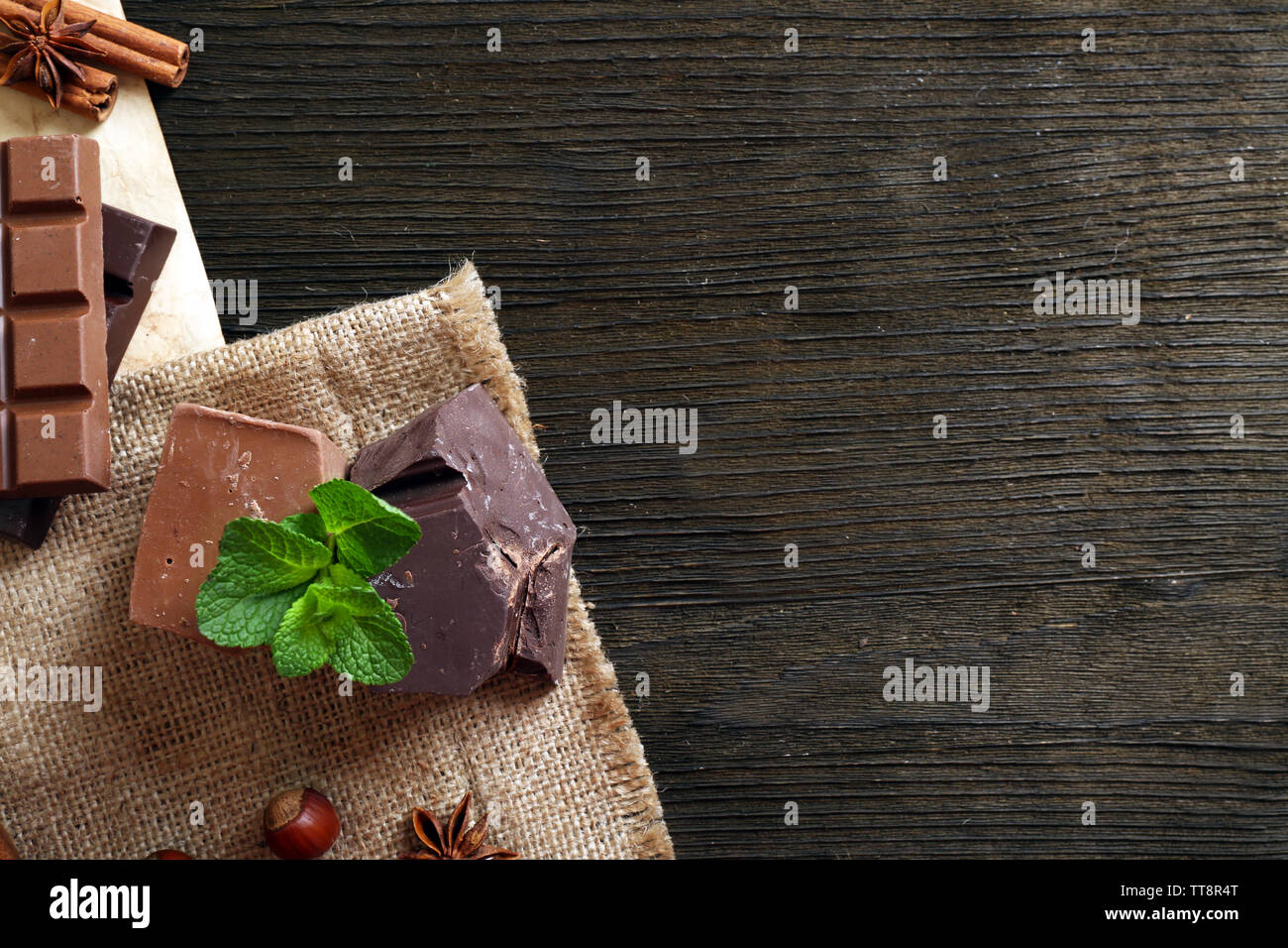 Still life with set of chocolate on table, top view Stock Photo - Alamy
