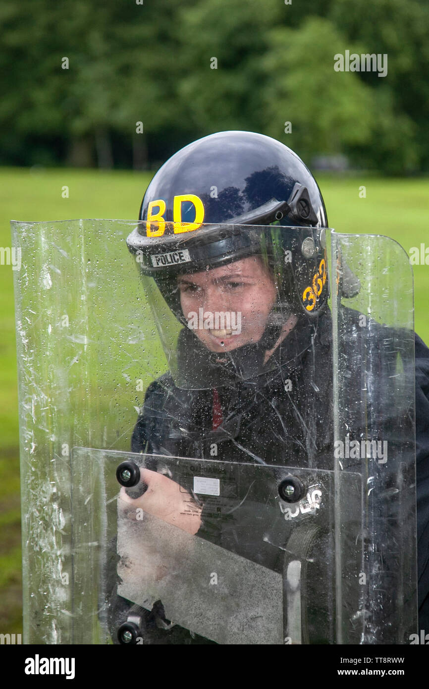 Policewoman with riot shield, Lancashire Constabulary, Leyland, UK ...
