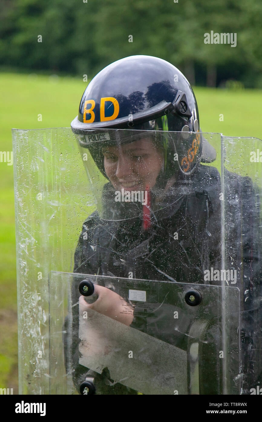Policewoman with riot shield, Lancashire Constabulary, Leyland, UK ...
