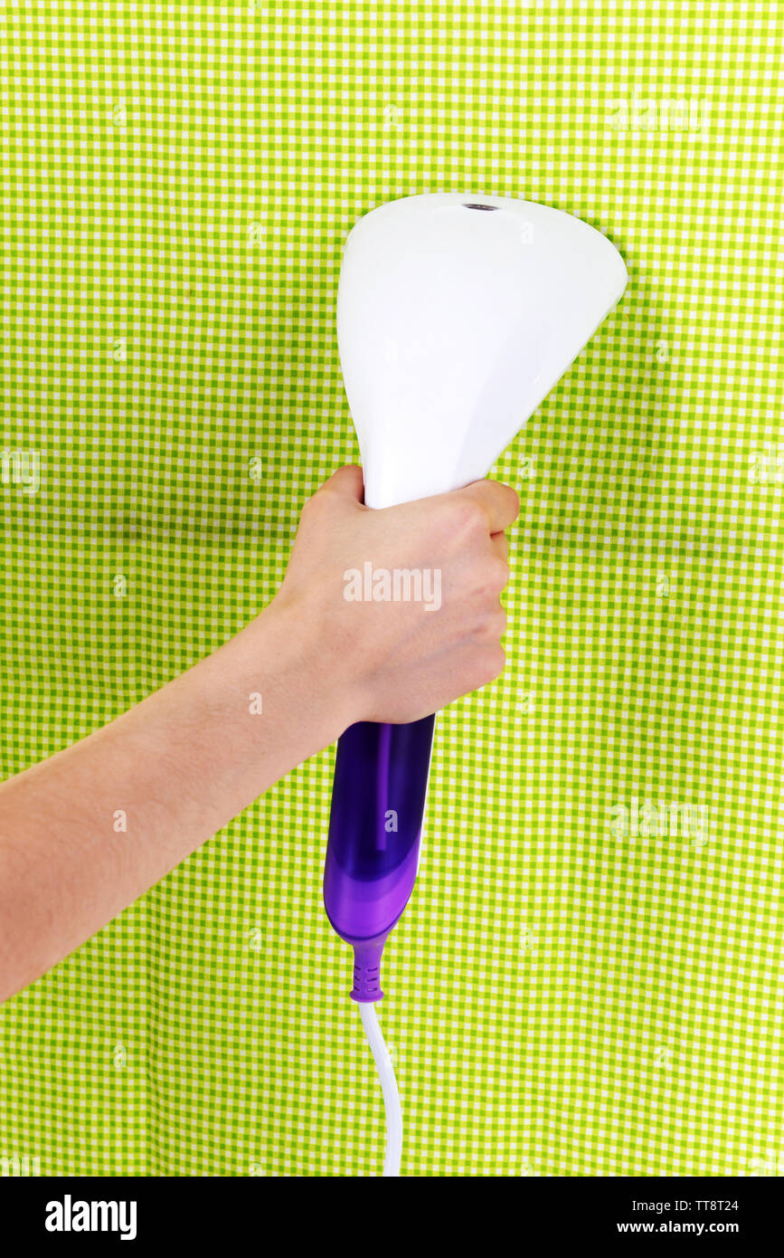 Cloth steamer hi-res stock photography and images - Alamy