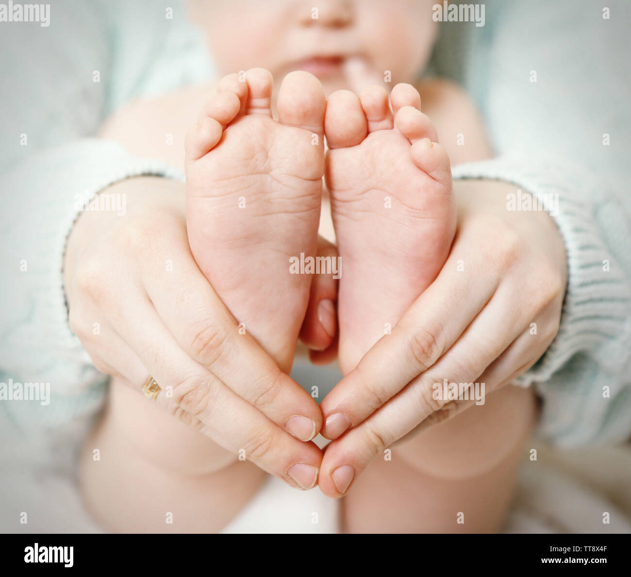 Newborn baby in mother hugs, close-up Stock Photo - Alamy