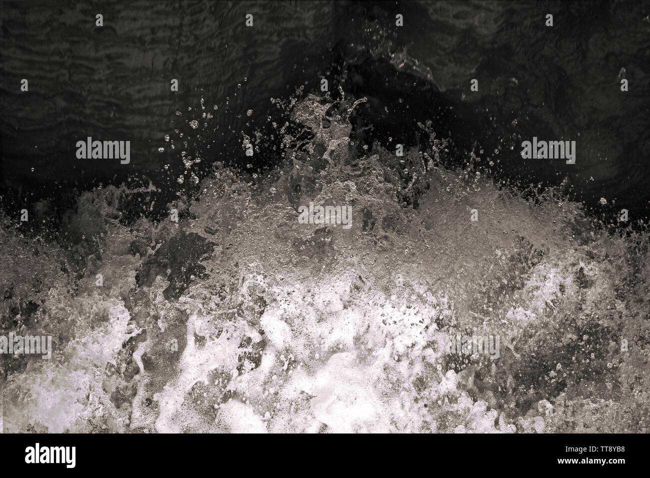 Water splash in black and white. Darkness ans shadow. Water in dynamic ...