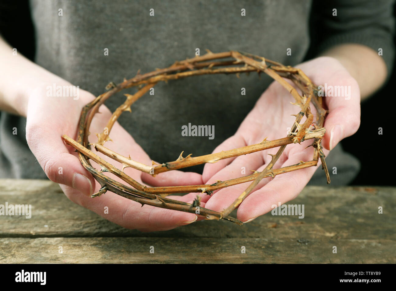 Crown of thorns in hands, close up Stock Photo - Alamy