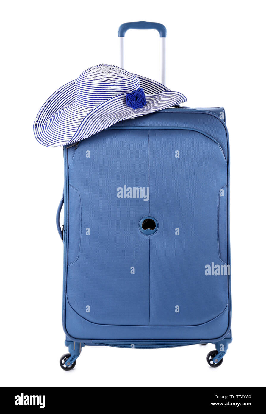 Blue suitcase with hat isolated on white Stock Photo - Alamy