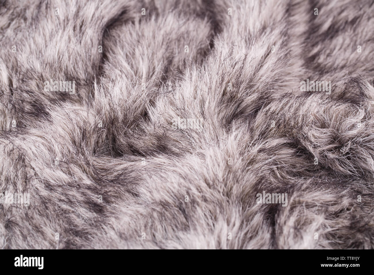 Artificial fur background closeup picture Stock Photo - Alamy