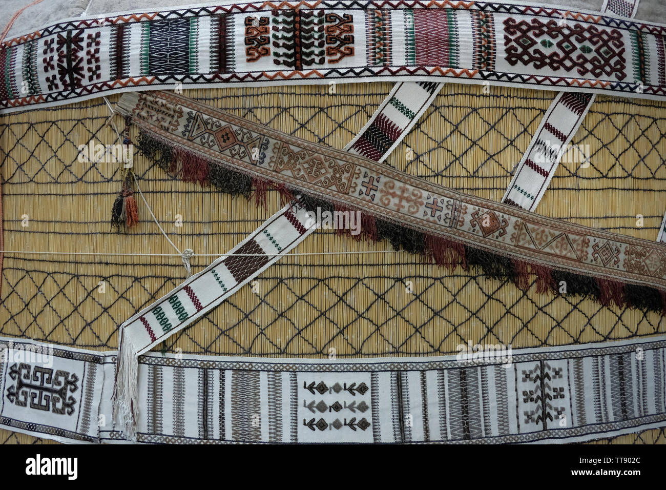 Traditional pattern-based hand woven woolen silk bands decorates the ...