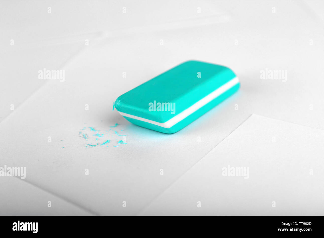 Eraser on paper background Stock Photo - Alamy