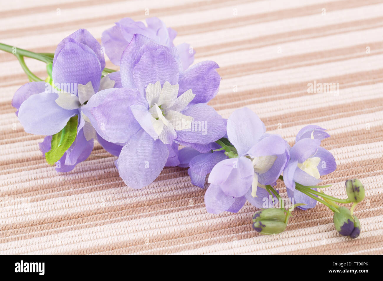 Pink fabric flowers on cloth background, closeup picture Stock Photo ...