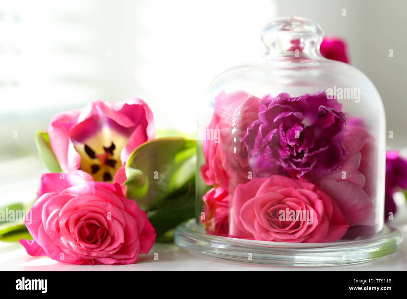 Beautiful composition with flowers on light background Stock Photo - Alamy