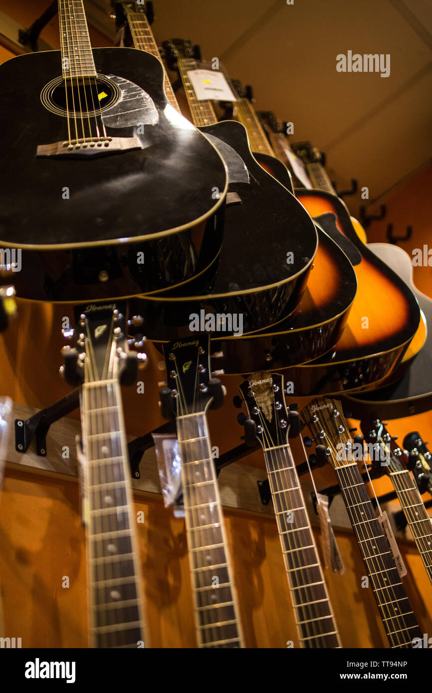 Guitars hanging on walls hi-res stock photography and images - Alamy