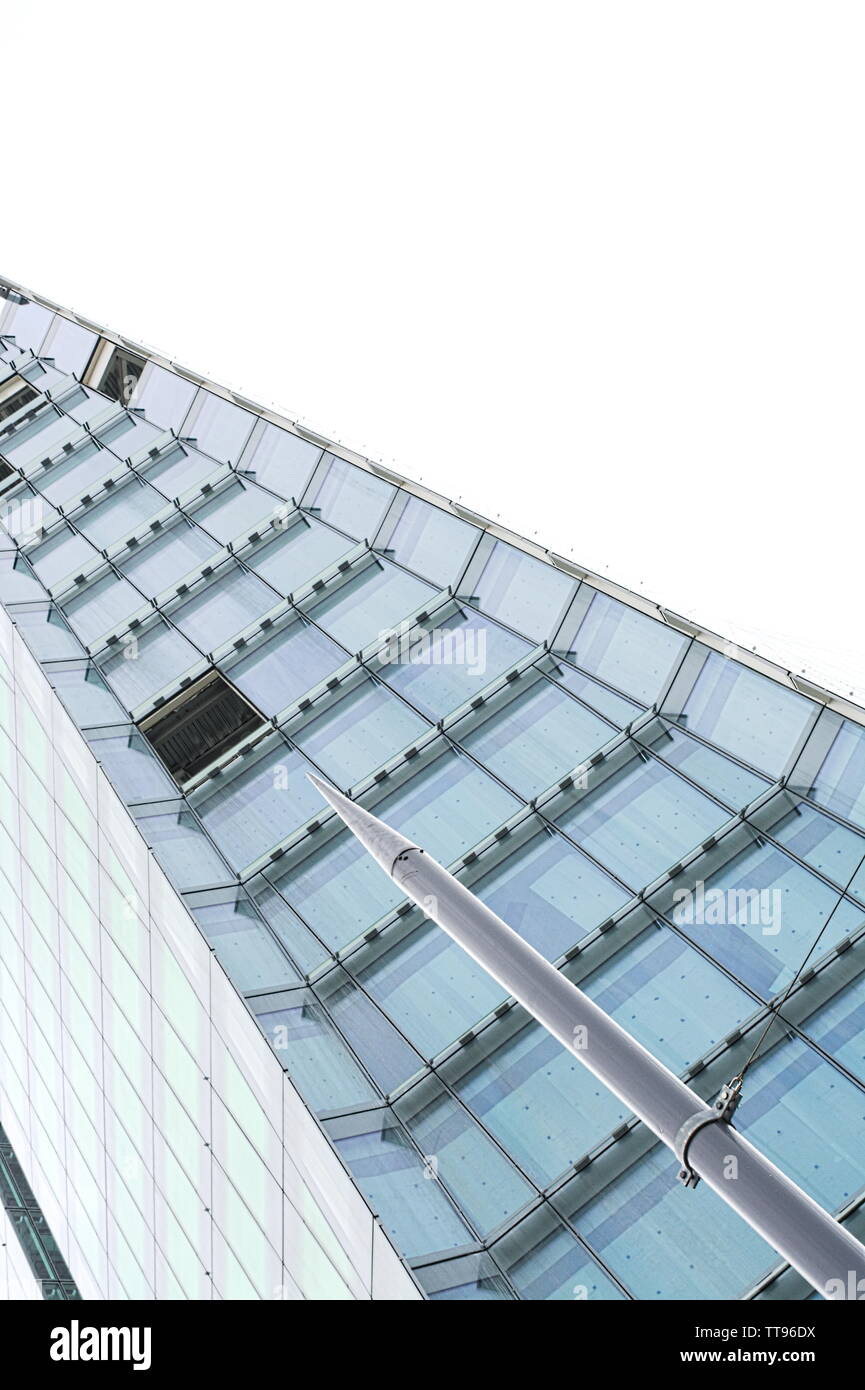 Glass office building in construction. Some windows are missing Stock ...