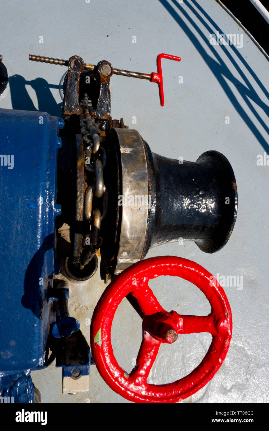 anchor windlass on forecastle of boat in port of sassnitz, ruegen ...