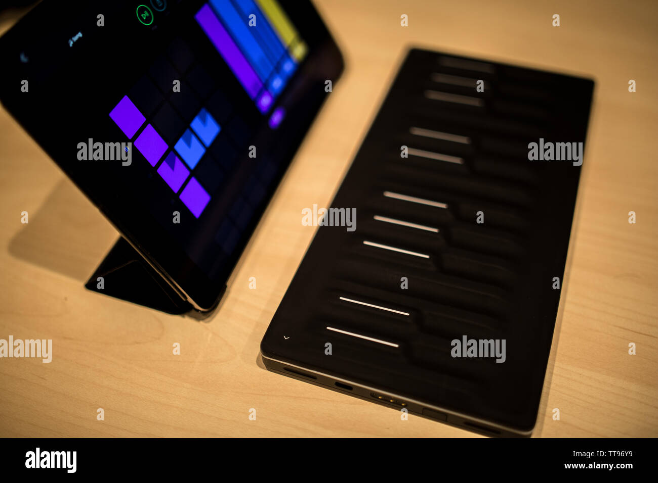 pro tablet for artist with pencil flat lay top view with midi keyboard ...