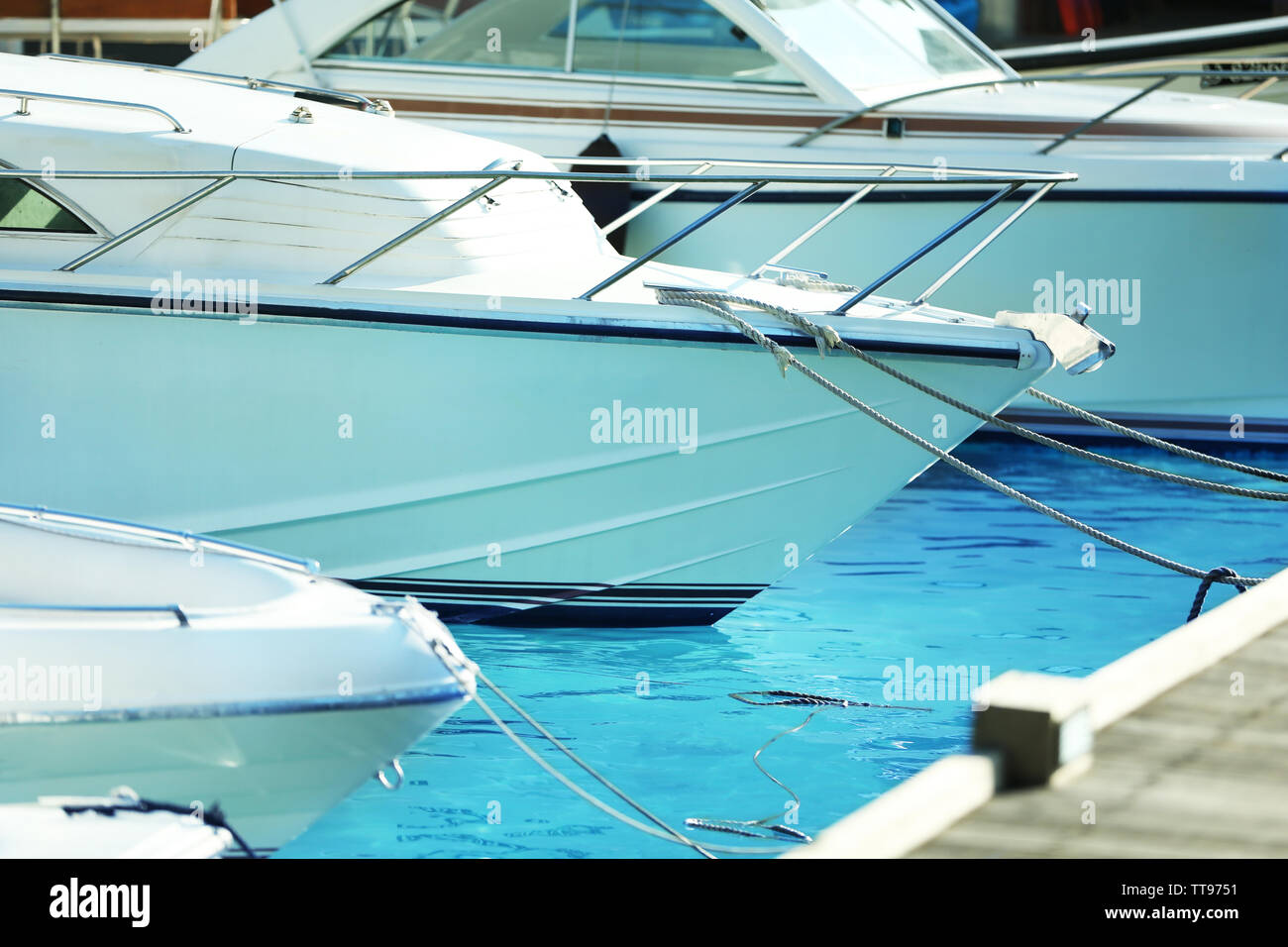 Yacht berth in ocean water in resort Stock Photo - Alamy