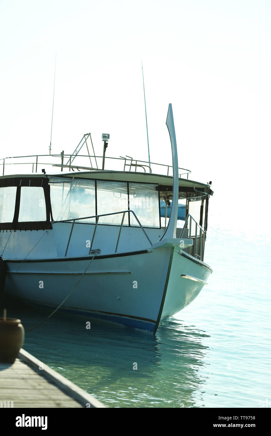 Yacht berth in ocean water in resort Stock Photo - Alamy
