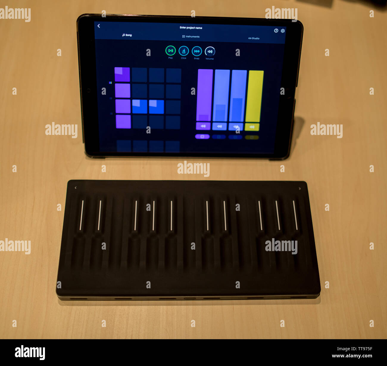 pro tablet for artist with pencil flat lay top view with midi keyboard ...