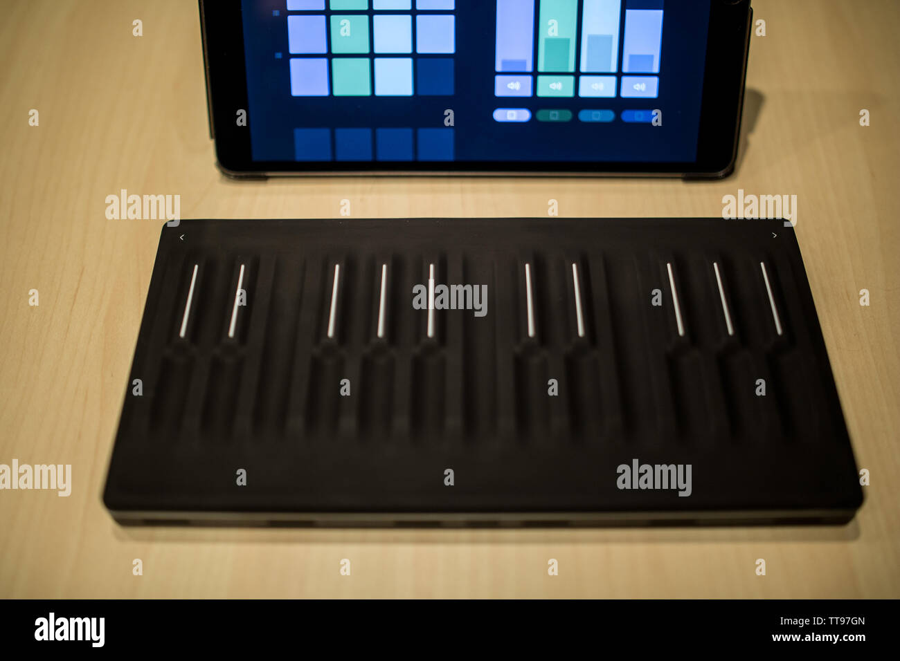 pro tablet for artist with pencil flat lay top view with midi keyboard ...