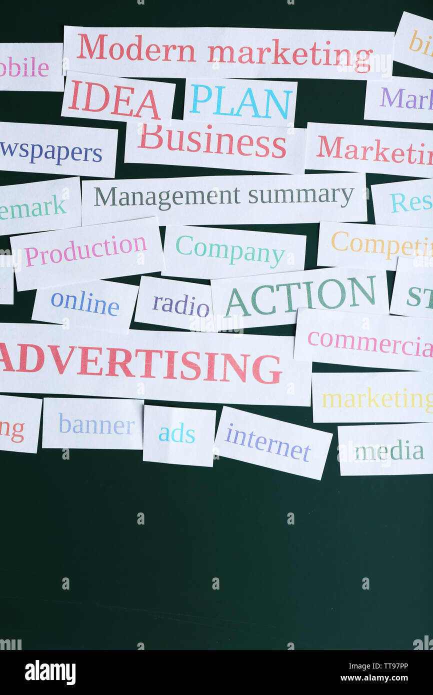 Themed words on blackboard background Stock Photo - Alamy