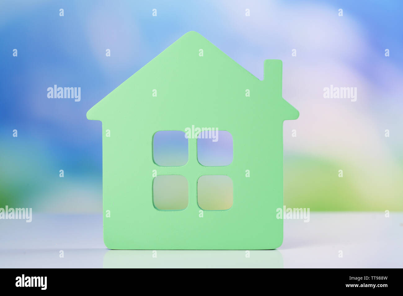 Toy house on natural background Stock Photo - Alamy