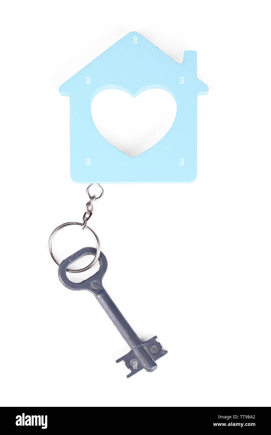 Toy house with key isolated on white Stock Photo - Alamy