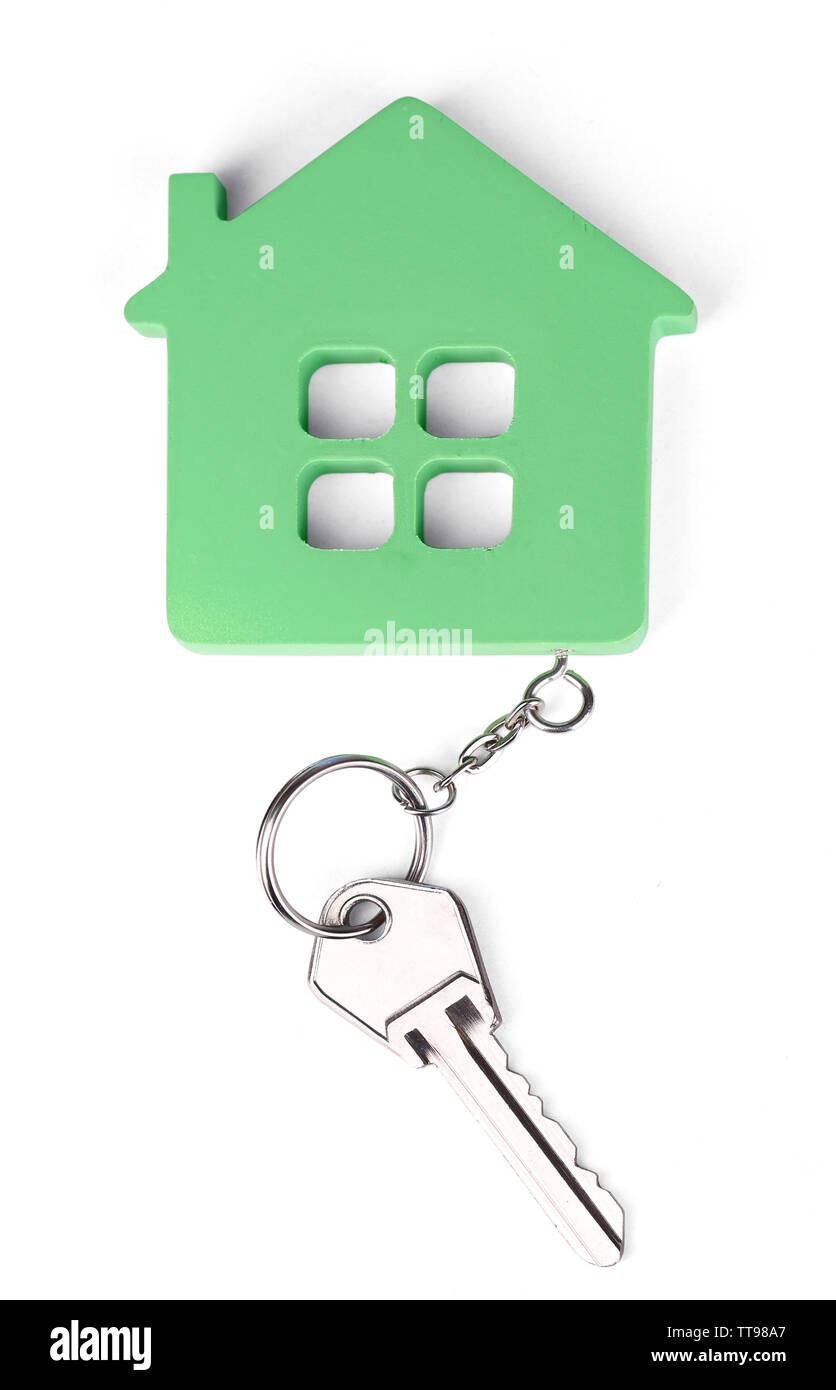 Toy house with key isolated on white Stock Photo - Alamy