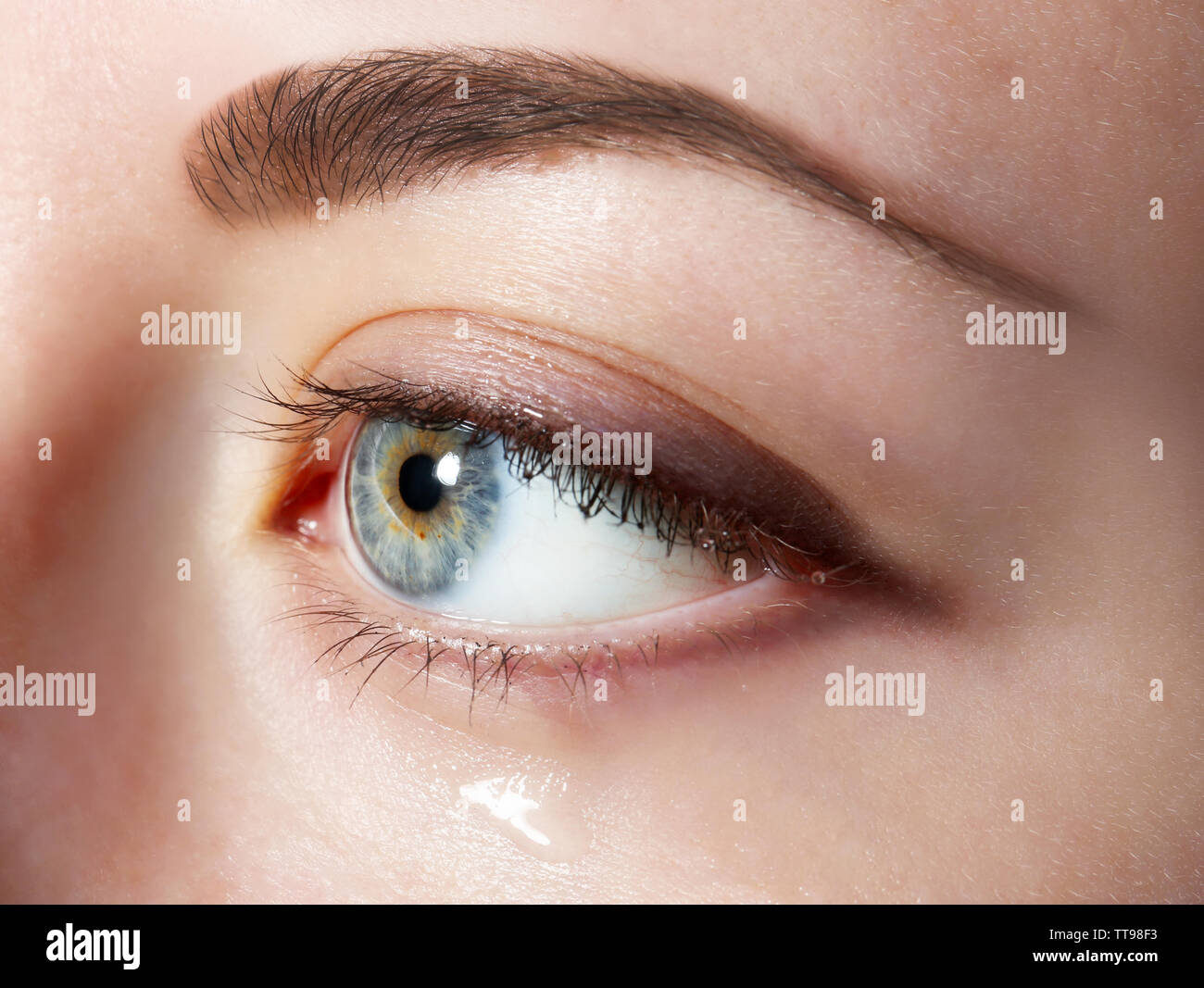 Close up eye tear dripping hi-res stock photography and images - Alamy