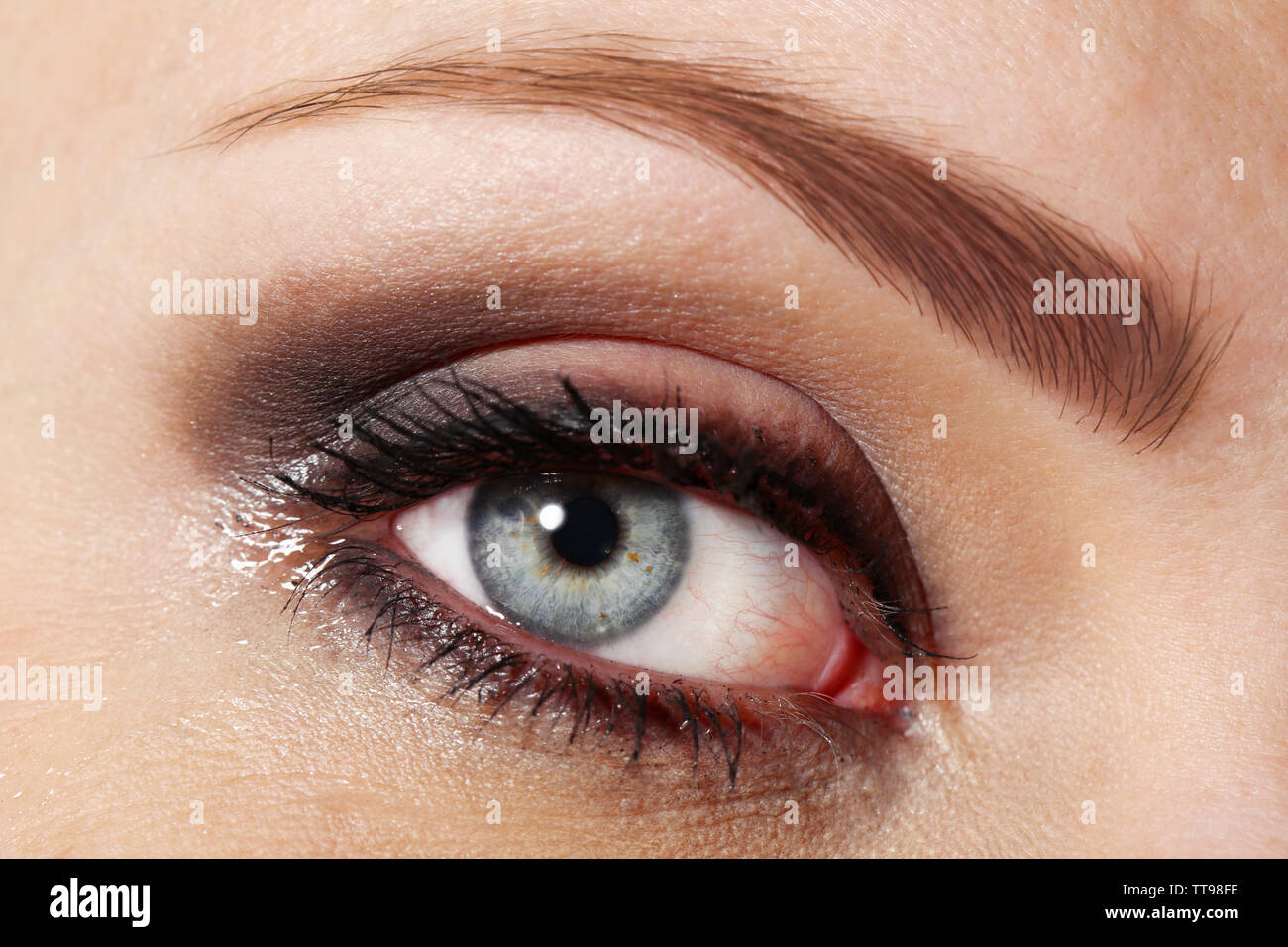 Close up of teary eye hi-res stock photography and images - Alamy