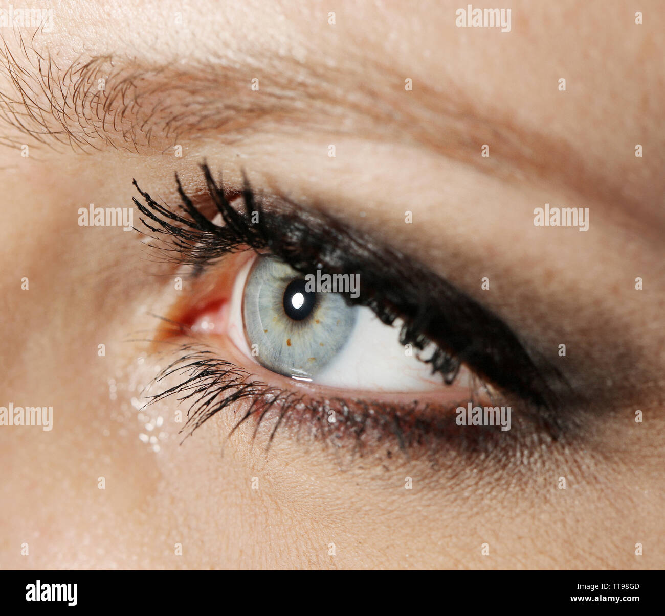 Close up of teary eye hi-res stock photography and images - Alamy