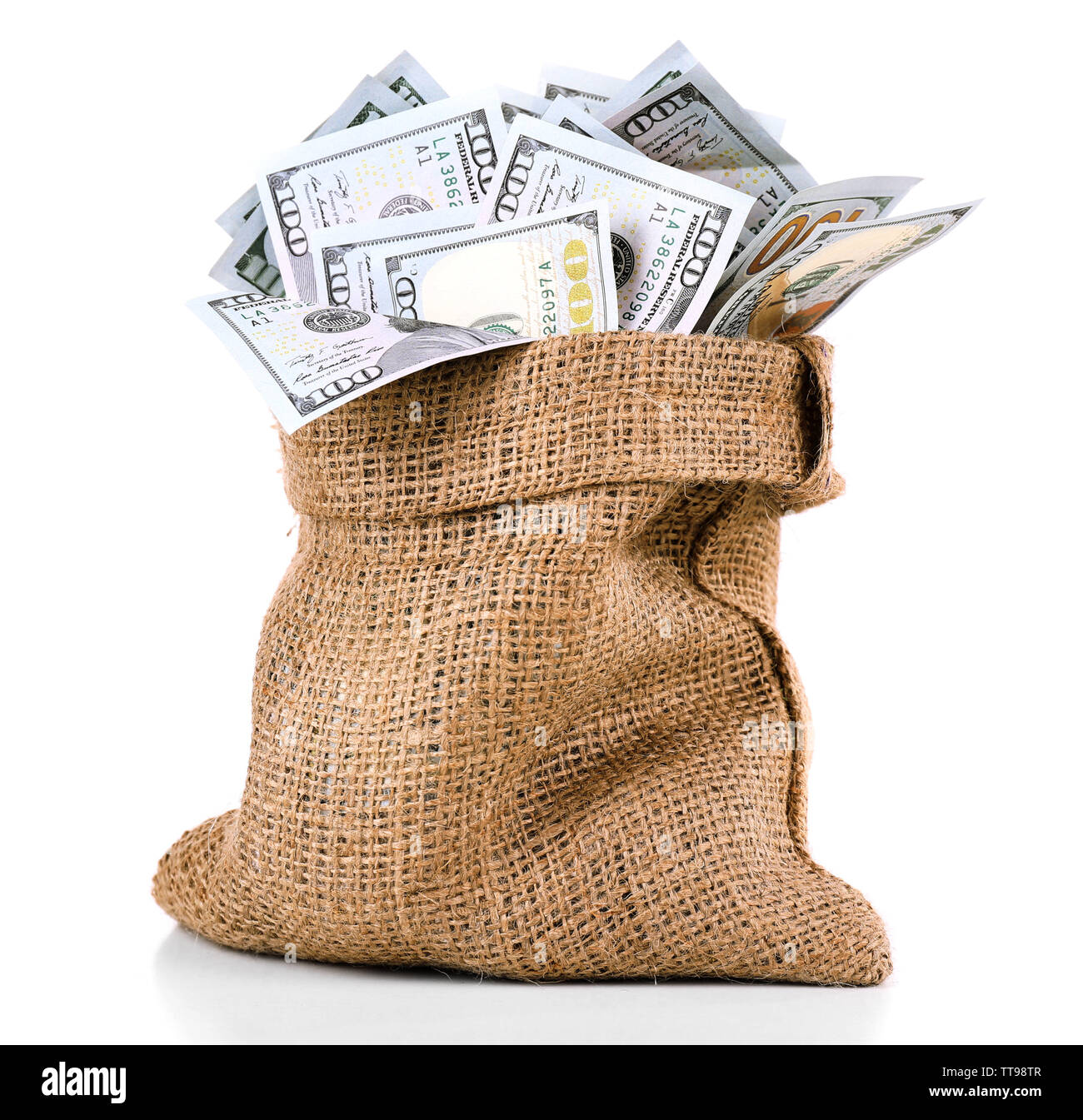 Money in bag isolated on white Stock Photo - Alamy