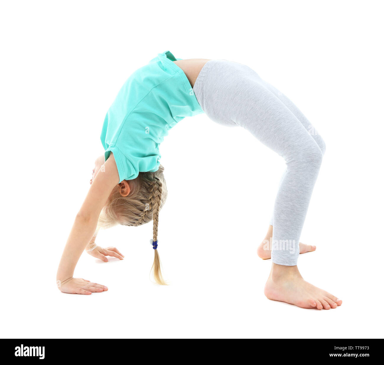 Little girl doing exercises isolated on white Stock Photo - Alamy